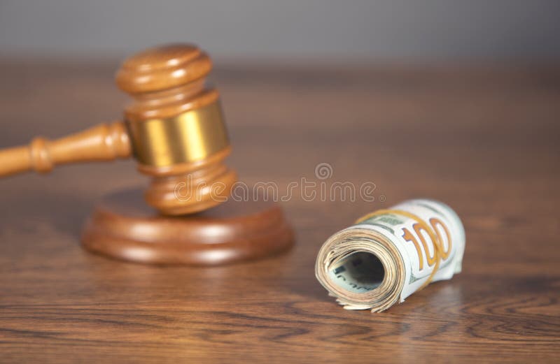 Dollar and judge on table stock photo. Image of hammer - 179649288