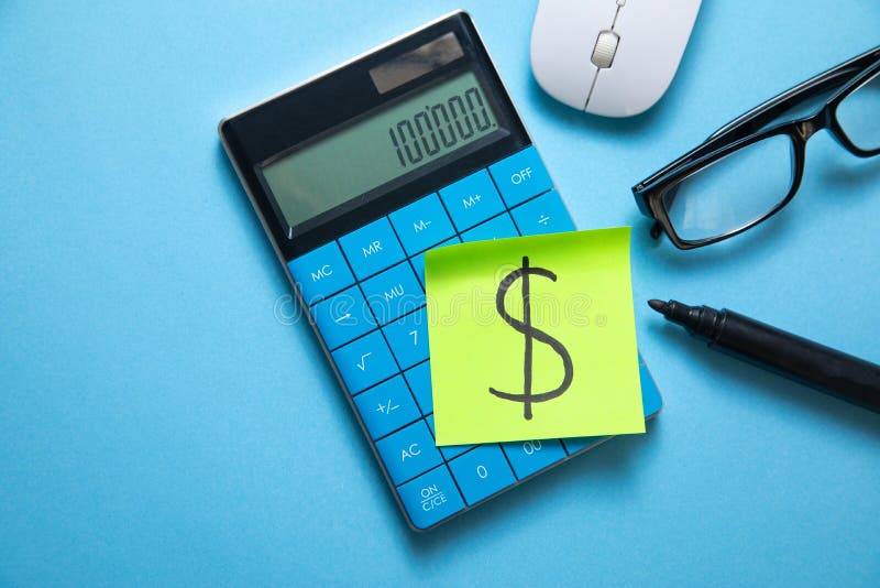 Dollar Symbol on the Sticky Note with a Calculator and Other Objects ...