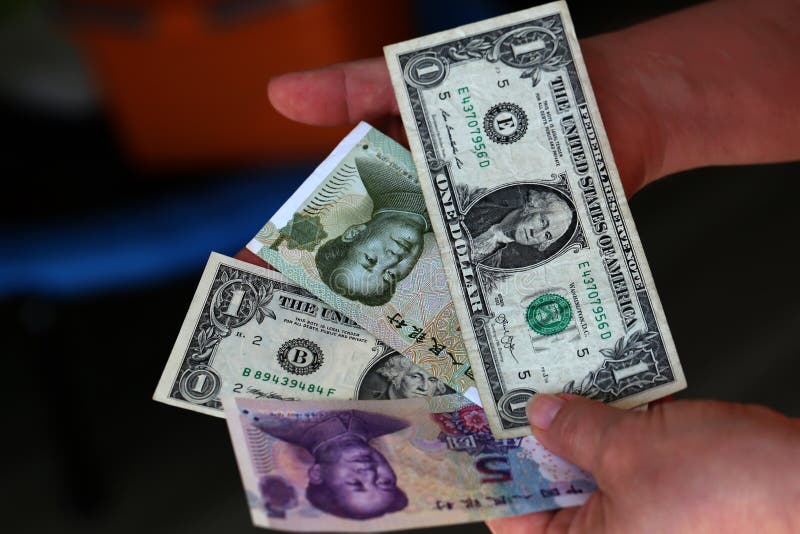 Dollar vs Yuan stock photo. Image of banknote, battle - 156395934