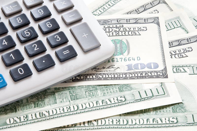 Dollars and calculator stock photo. Image of currency - 14766558