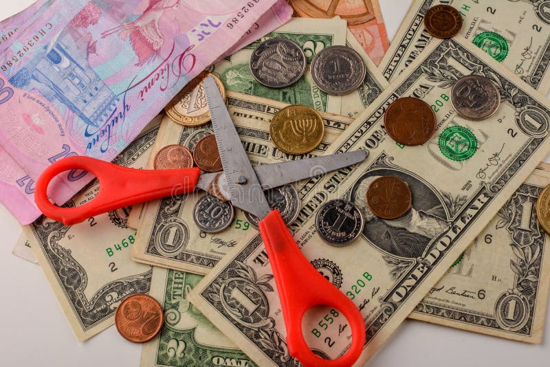 Dollars, Coins, Scissors and Other Money are on the Table Stock Photo ...