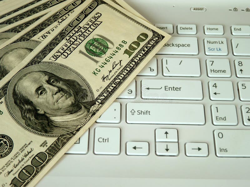 Dollars and computer stock photo. Image of exclusive - 46887080