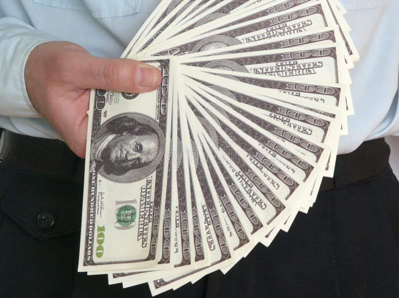 Dollars in hand stock image. Image of dollar, business - 13494261