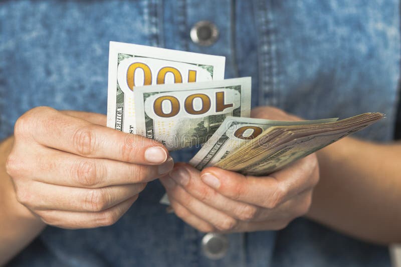 Dollars in Hand, Small Salary. Winning the Lottery Stock Photo - Image ...