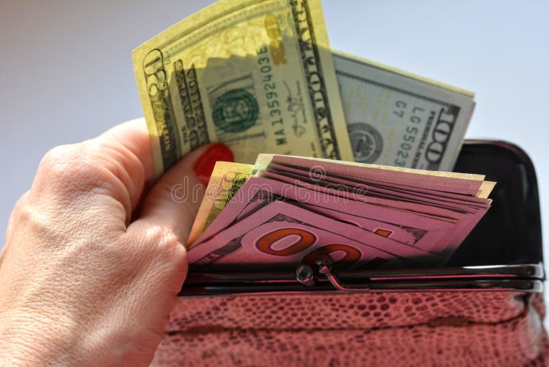 Dollars Money in the Female Hand in Wallet on a White Background Stock ...