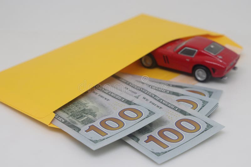 Dollars and a Red Car in a Yellow Envelope, Auto Purchase. Stock Image ...