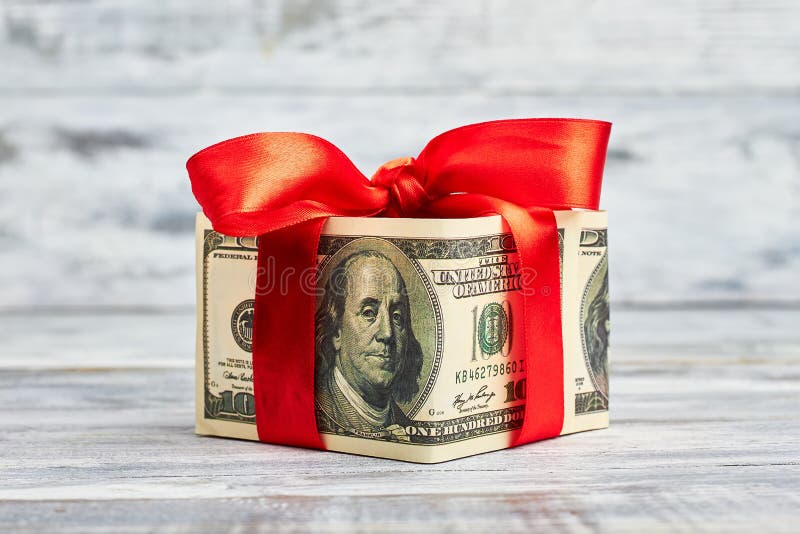 Money Dollars Wrapped In A Bow On A Gift Stock Image - Image of present ...