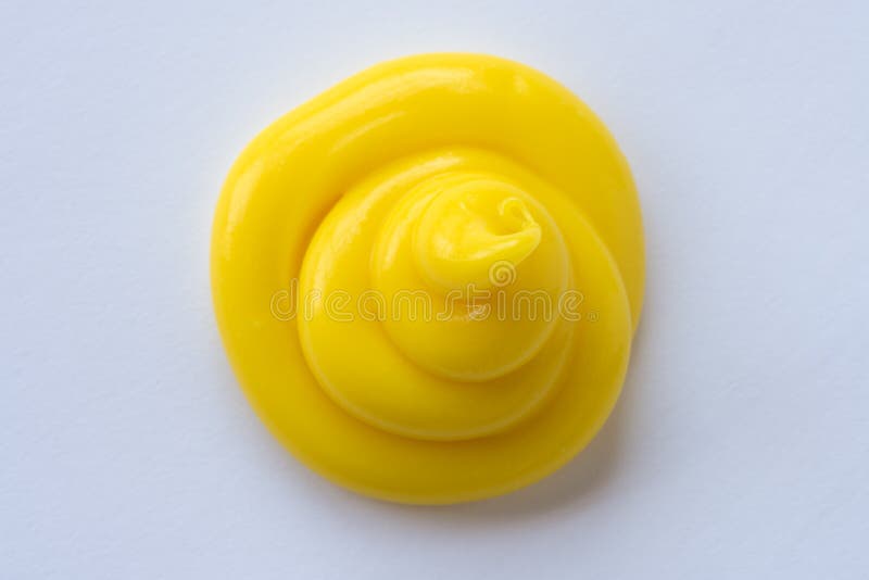 A Dollop of Yellow Icing stock photo. Image of baking - 259941690