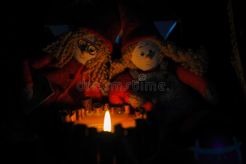 Dolls are Sitting in Evening by a Makeshift Bonfire in the Form of a ...