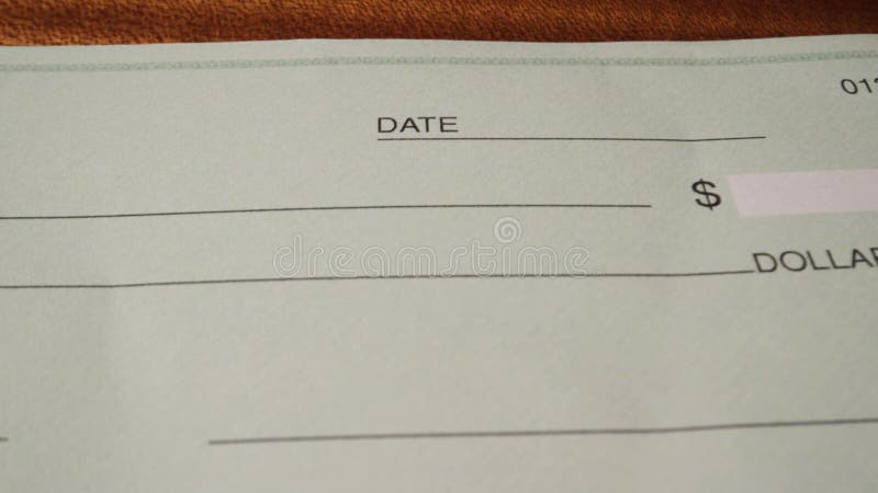 7 Dolly on Blank Green Generic Check on Table with Completed Stamp ...