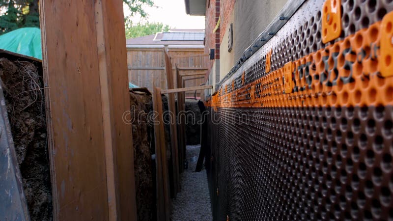 Dolly Forward Basement Dug Out for Waterproofing Stock Video - Video of ...