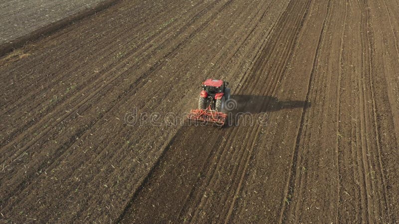 Above Dolly Move of Tractor As Dragging Plow To Plows Agricultural ... Above Dolly Move of Tractor As Dragging Plow To Plows Agricultural ...
