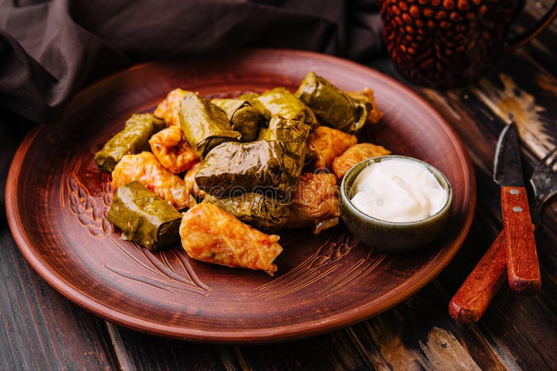 Dolma with Meat, Rice in Grape Leaves Stock Image - Image of black ...