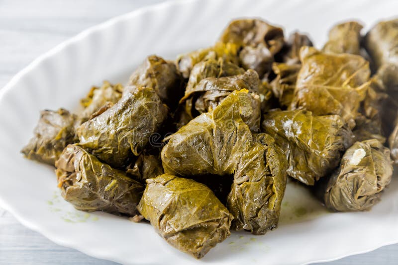 Dolma Stuffed Meat in Grape Leaves on White Plate Close Up with ...