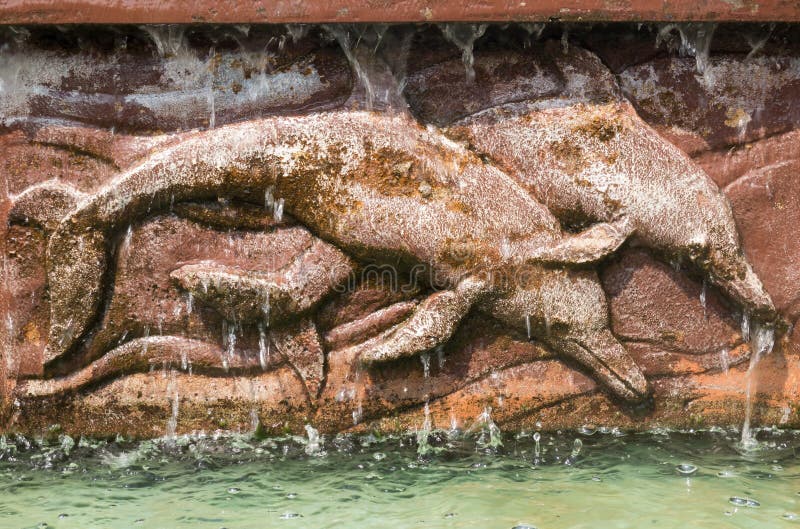 Dolphin bas-relief stock photo. Image of design, culture - 39273518