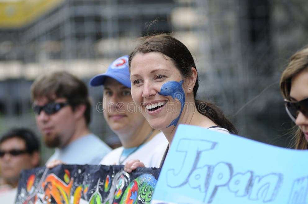 Dolphin hunting protest. editorial stock photo. Image of happy - 26393073