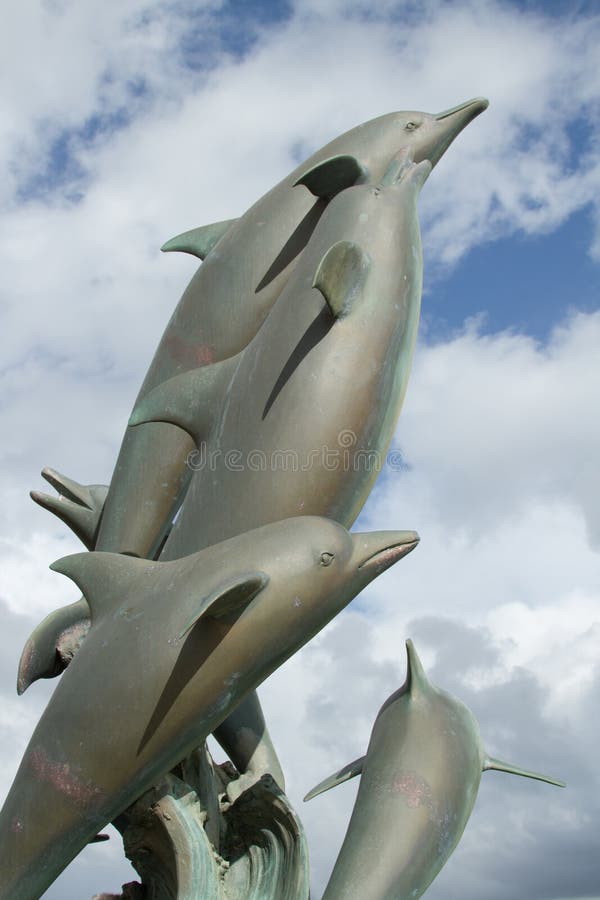 Dolphin statue. stock image. Image of jumping, group - 26405459