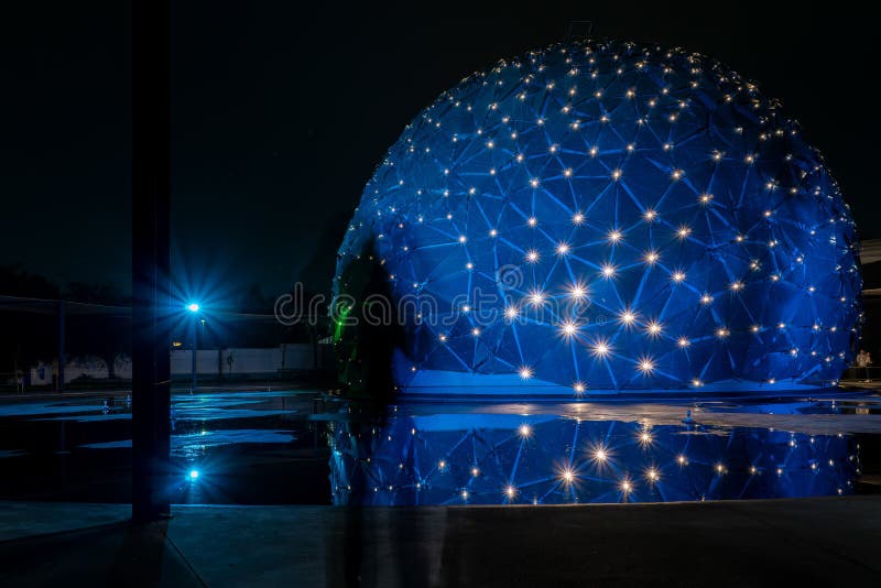 Dome Shaped Building, with Colored Lights, Reflection in Water ...