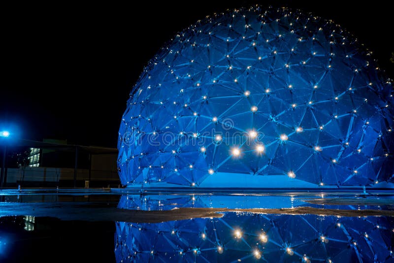 Dome Shaped Building, with Colored Lights, Reflection in Water ...