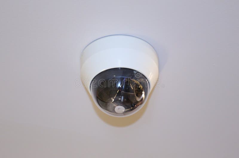 A Dome-shaped CCTV Camera Mounted Under the Ceiling of the Meeting Room ...