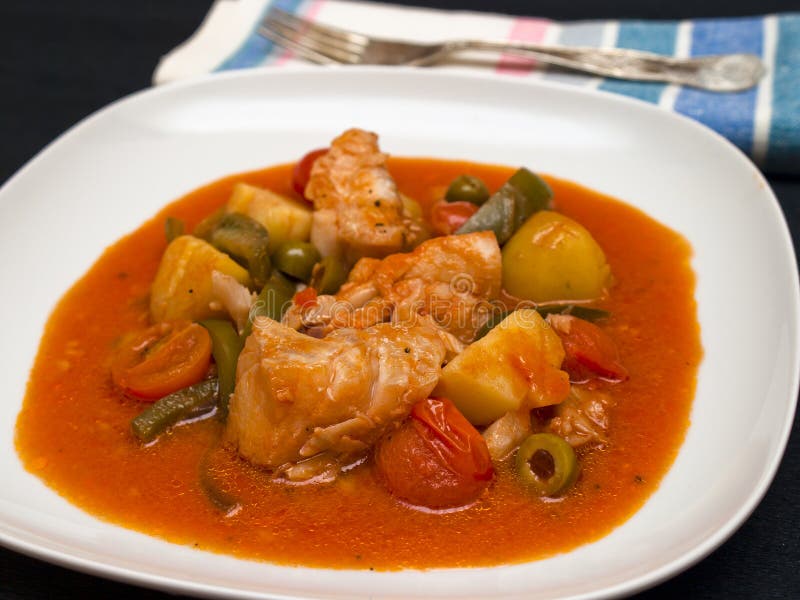 Dominican cod dish stock photo. Image of tomatoes, dish - 79619438
