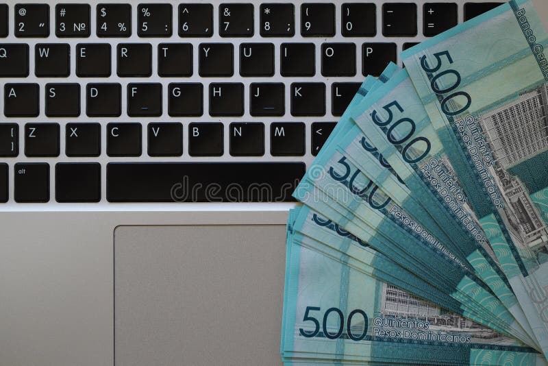 Dominican Republic Money is on the Keyboard. Stock Photo - Image of ...
