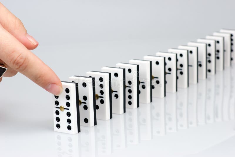 Finger Pushing Domino Pieces Stock Photo - Image of background, hand ...