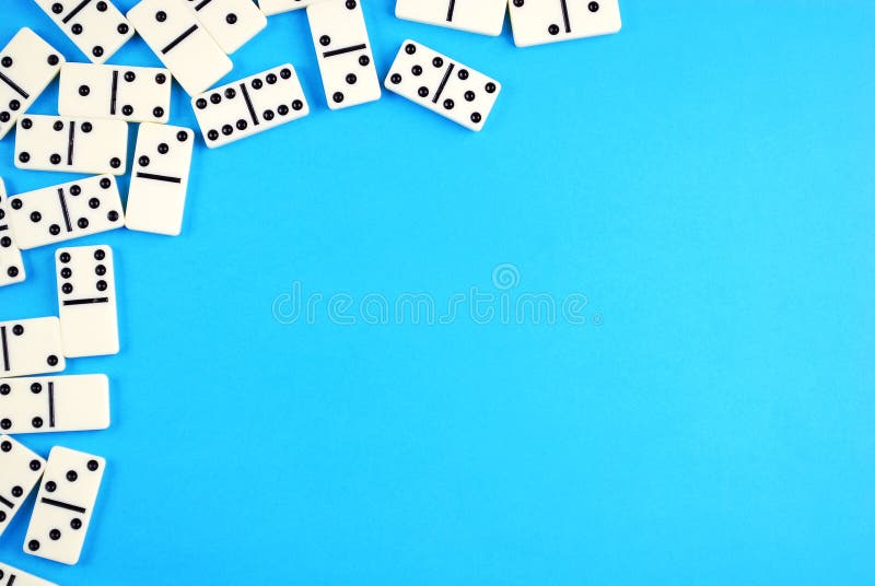 Domino Pieces on a Blue Background. Stock Photo - Image of play, gamble ...