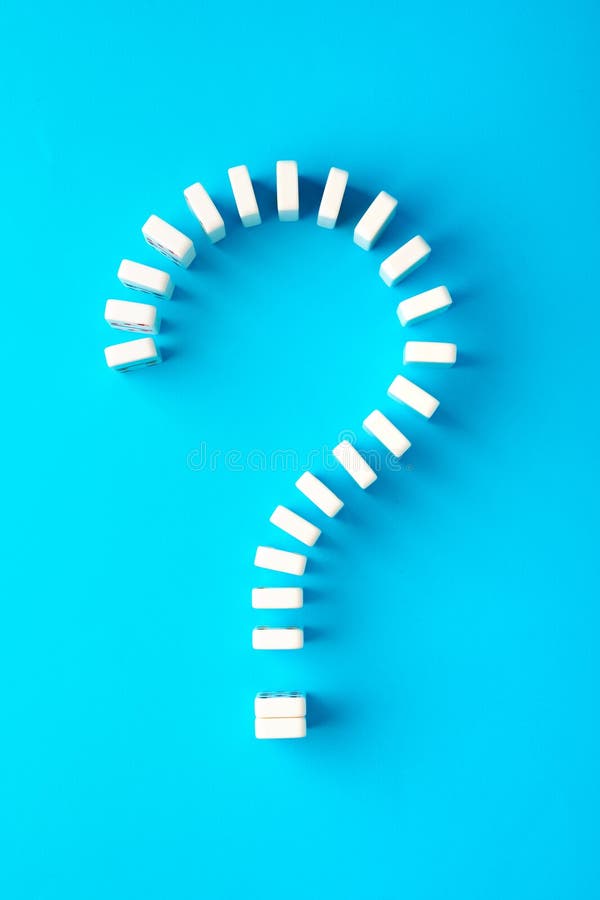 Domino Tiles Set in Question Sign Shape on Blue Background Stock Photo ...