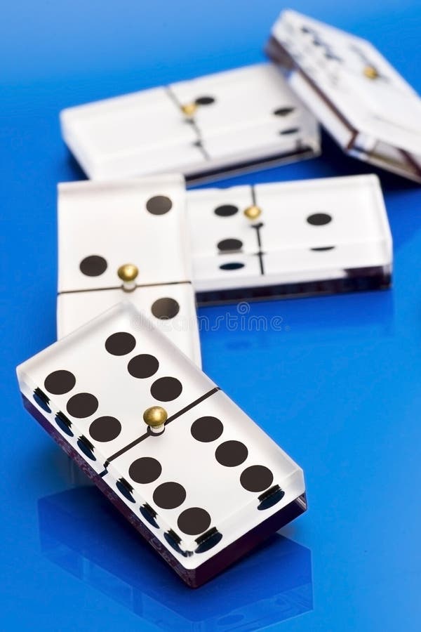 Dominoes on Blue stock photo. Image of hand, effect, business - 29880358