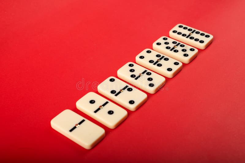Dominoes with Red Background, Copy Space and Various Angles Stock Image ...