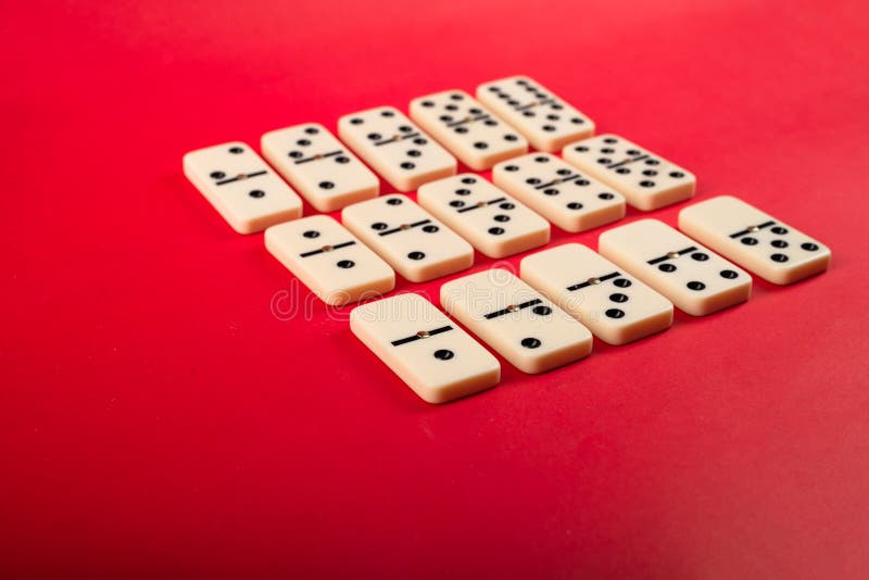 Dominoes with Red Background, Copy Space and Various Angles Stock Photo ...