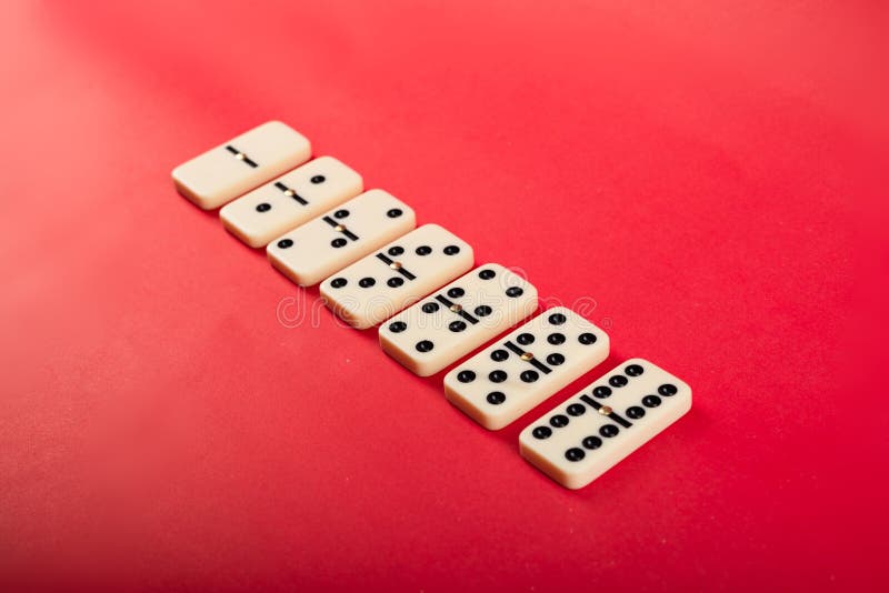 Dominoes with Red Background, Copy Space and Various Angles Stock Photo ...