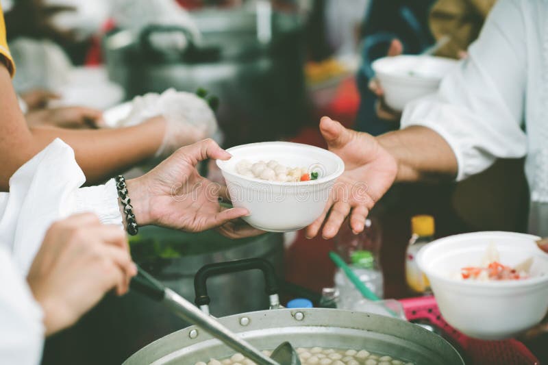 Donate Food To the Poor and Hungry: Concept of Feeding Stock Photo ...