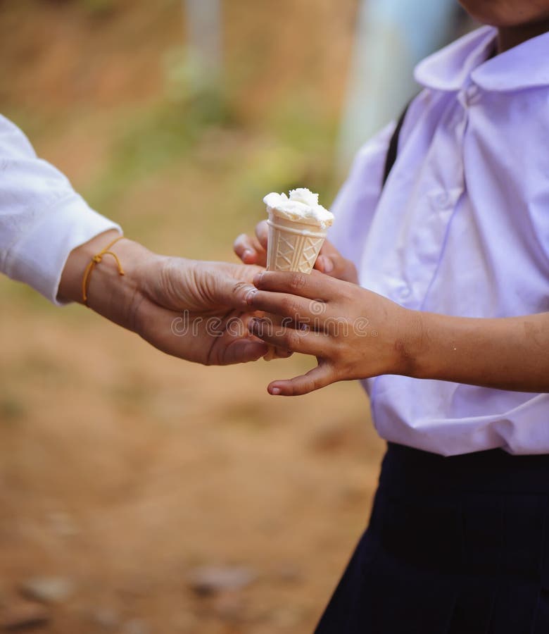 Donating Food from the Concern of Human Friends To the Poor Stock Photo ...