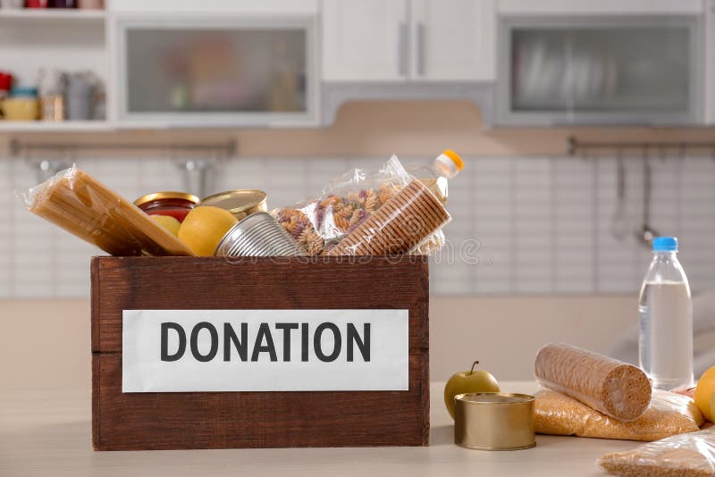 Donation Box and Different Products on Table Stock Photo - Image of ...