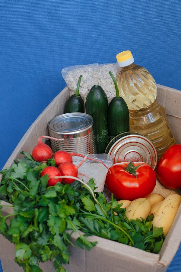 Donation Box with Food on a Blue Background Stock Photo - Image of ...