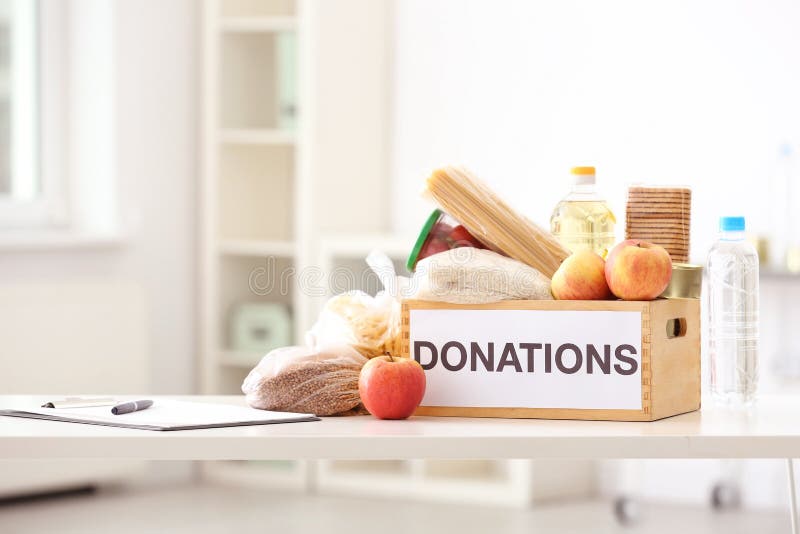 Donation Box with Food Products on Table Stock Photo - Image of apple ...