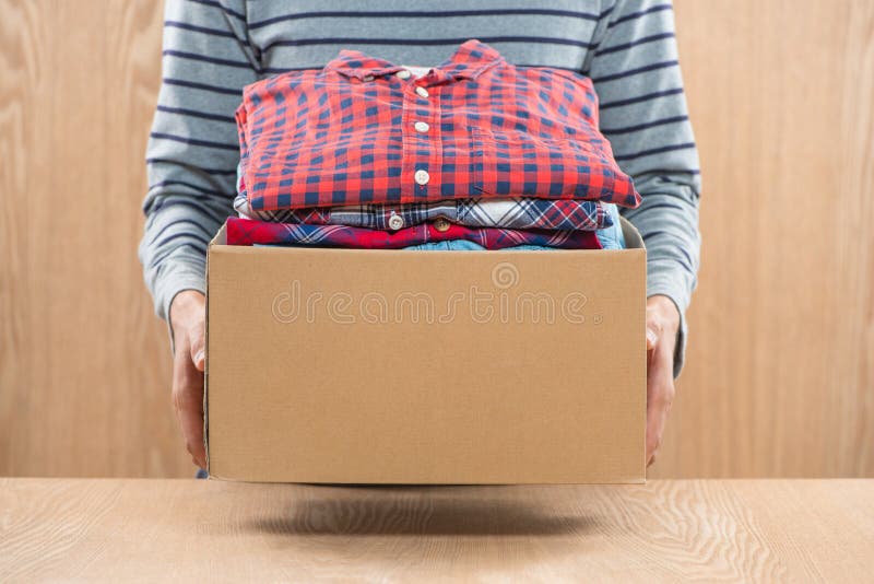 Donation Box for Poor with Clothing in Male Hands Stock Image - Image ...