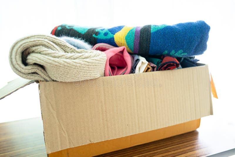 Donation Box with Used Clothes at Home To Support Help for Poor People ...