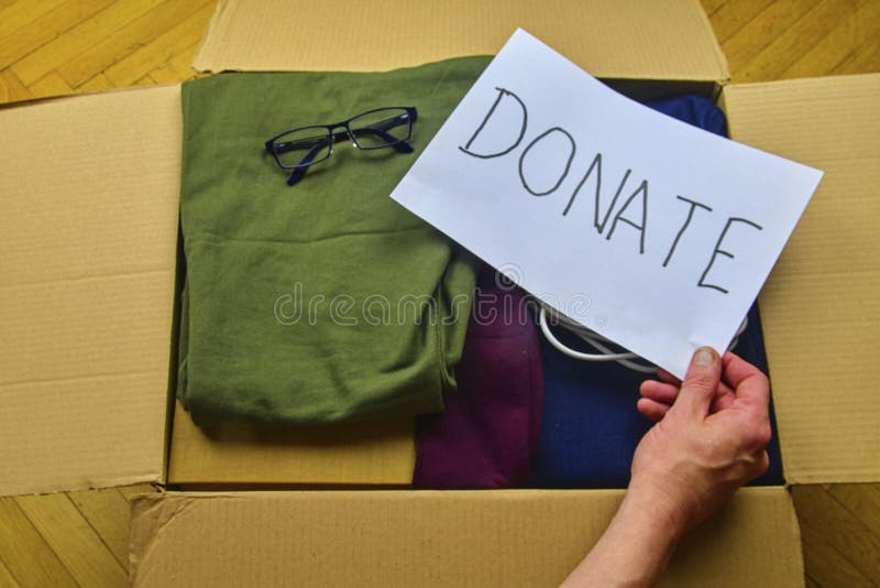 Donation Concepts with Hands of Man Holding Text Donate Giving and ...