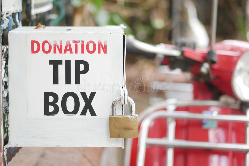 Donation Tip Box Outside with a Padlock in a Public Area Stock Photo ...