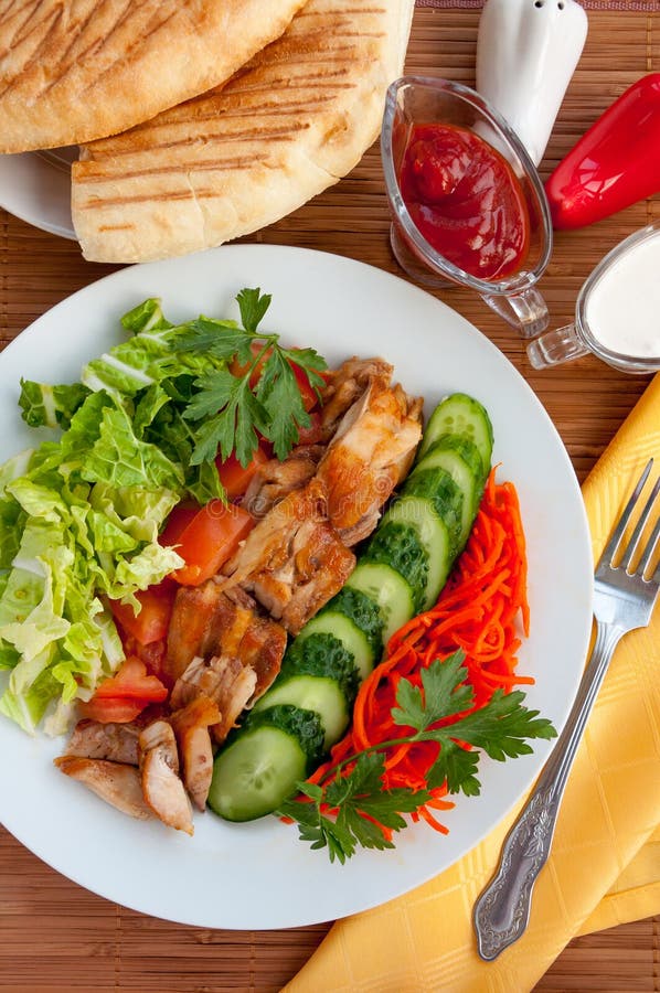 Doner Kebab on a Plate with Vegetables and Salad Stock Photo - Image of ...