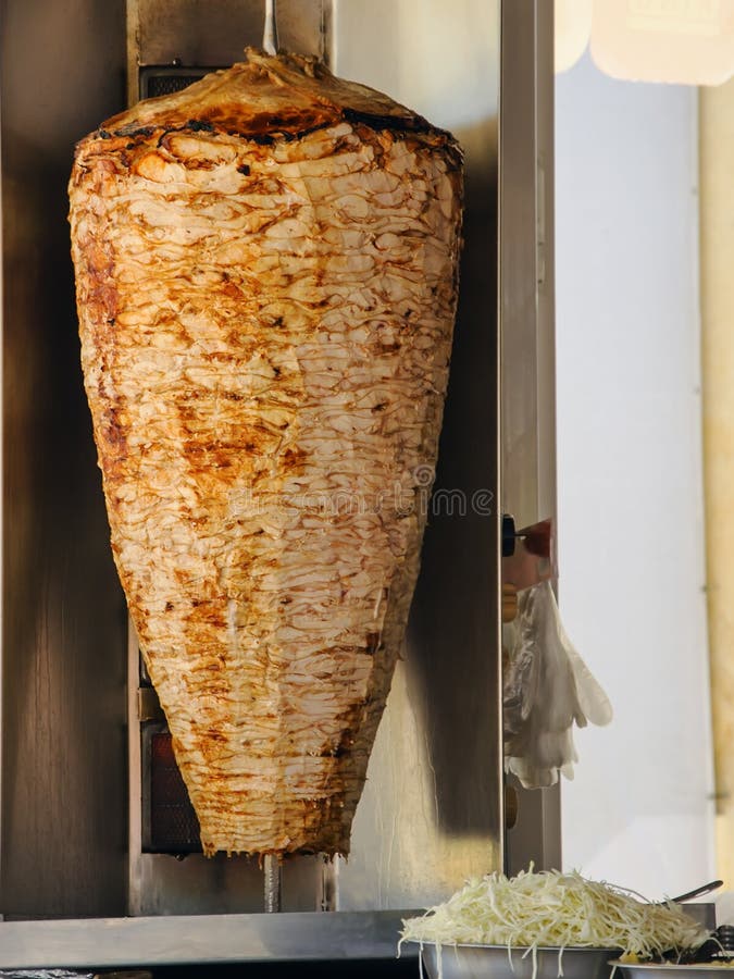 Doner Kebab on Rotating Vertical Spit in the East Stock Photo - Image ...