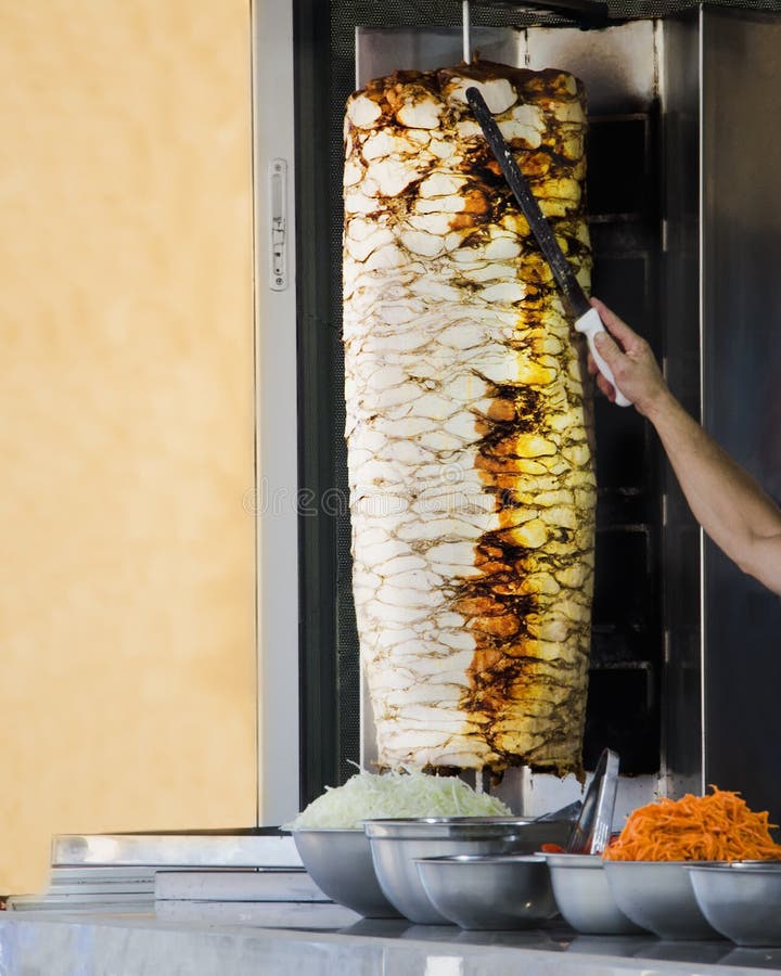 Doner Kebab on Rotating Vertical Spit in the East Stock Image - Image ...