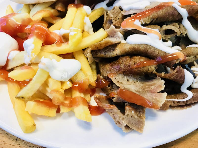 Doner meat and chips stock photo. Image of mayonnaise - 125278688