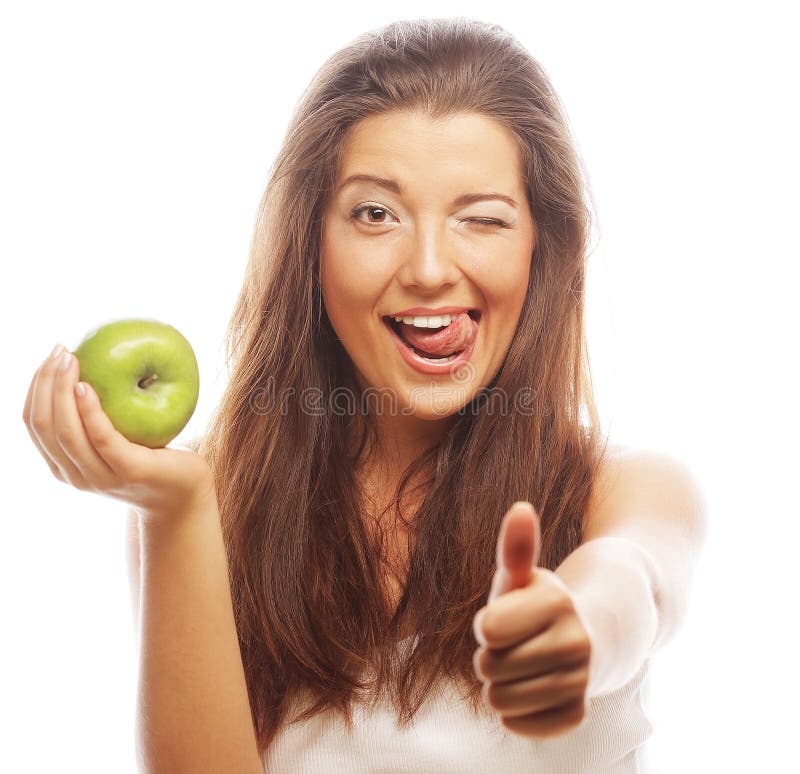 Donna Con Il Pollice Verde Di Mostra E Della Mela Su Immagine Stock ...