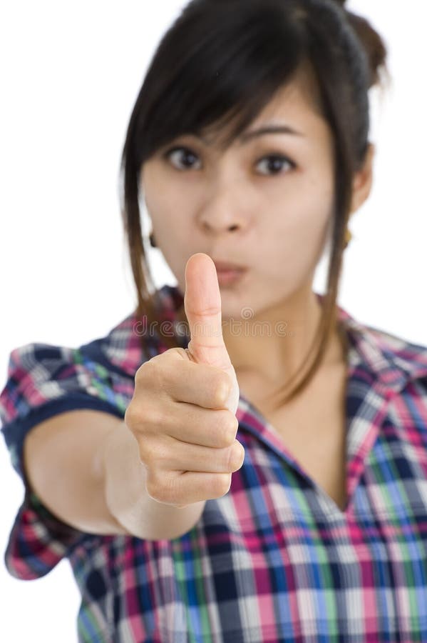 Donna con un pollice in su fotografia stock. Immagine di segno - 16528738