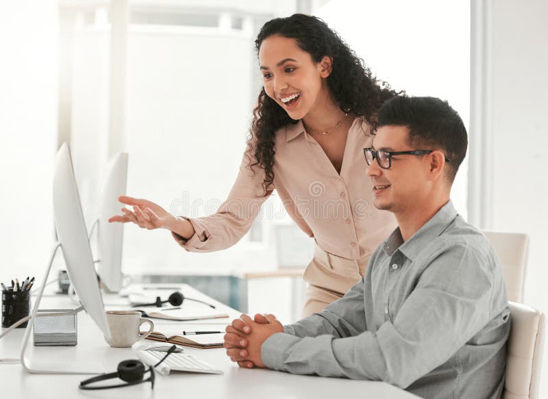 Dont Be Scared To Ask for Help. Two Young Colleagues Using a Computer ...