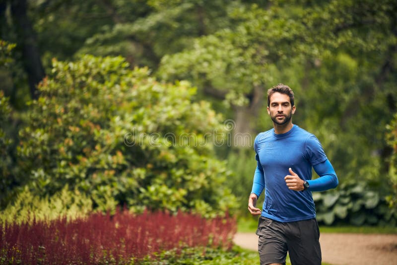 Dont Do Nothing, Do Something. a Sporty Middle-aged Man Out Running in ...